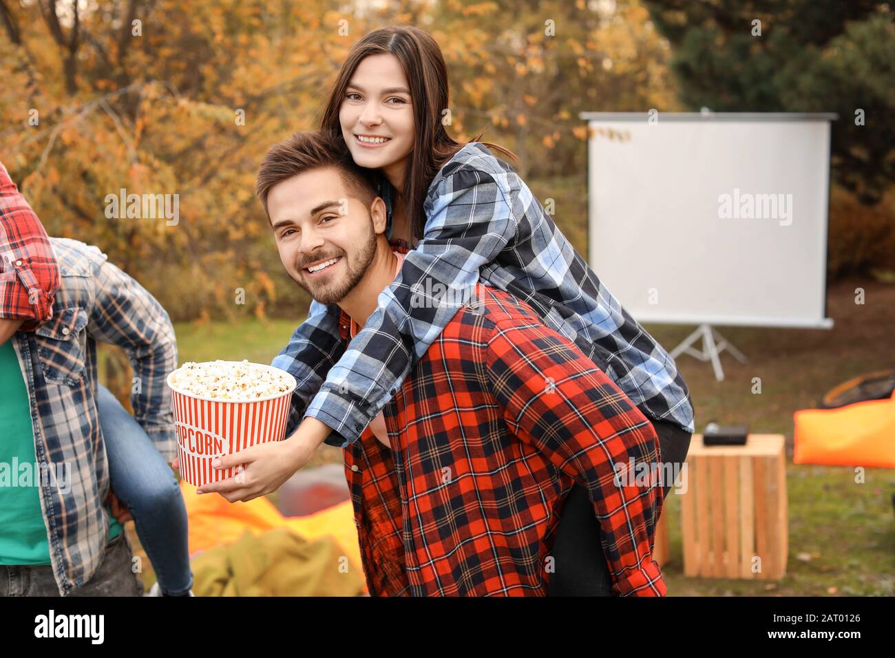 Couple having popcorn watching hi-res stock photography and images - Alamy