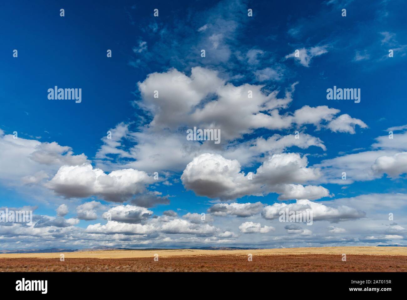 Field under cloud Stock Photo - Alamy
