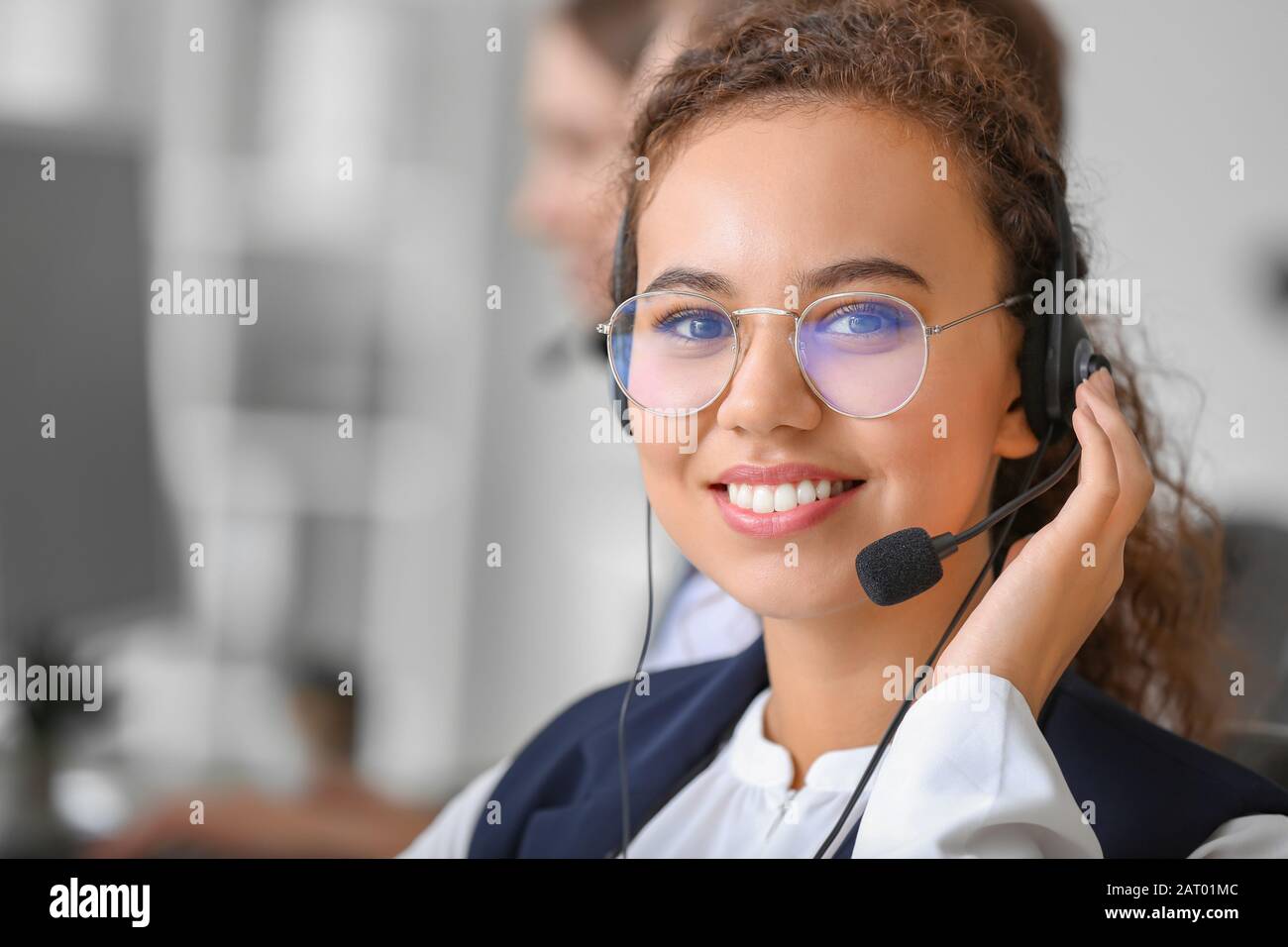 Technical support agent working in office Stock Photo - Alamy