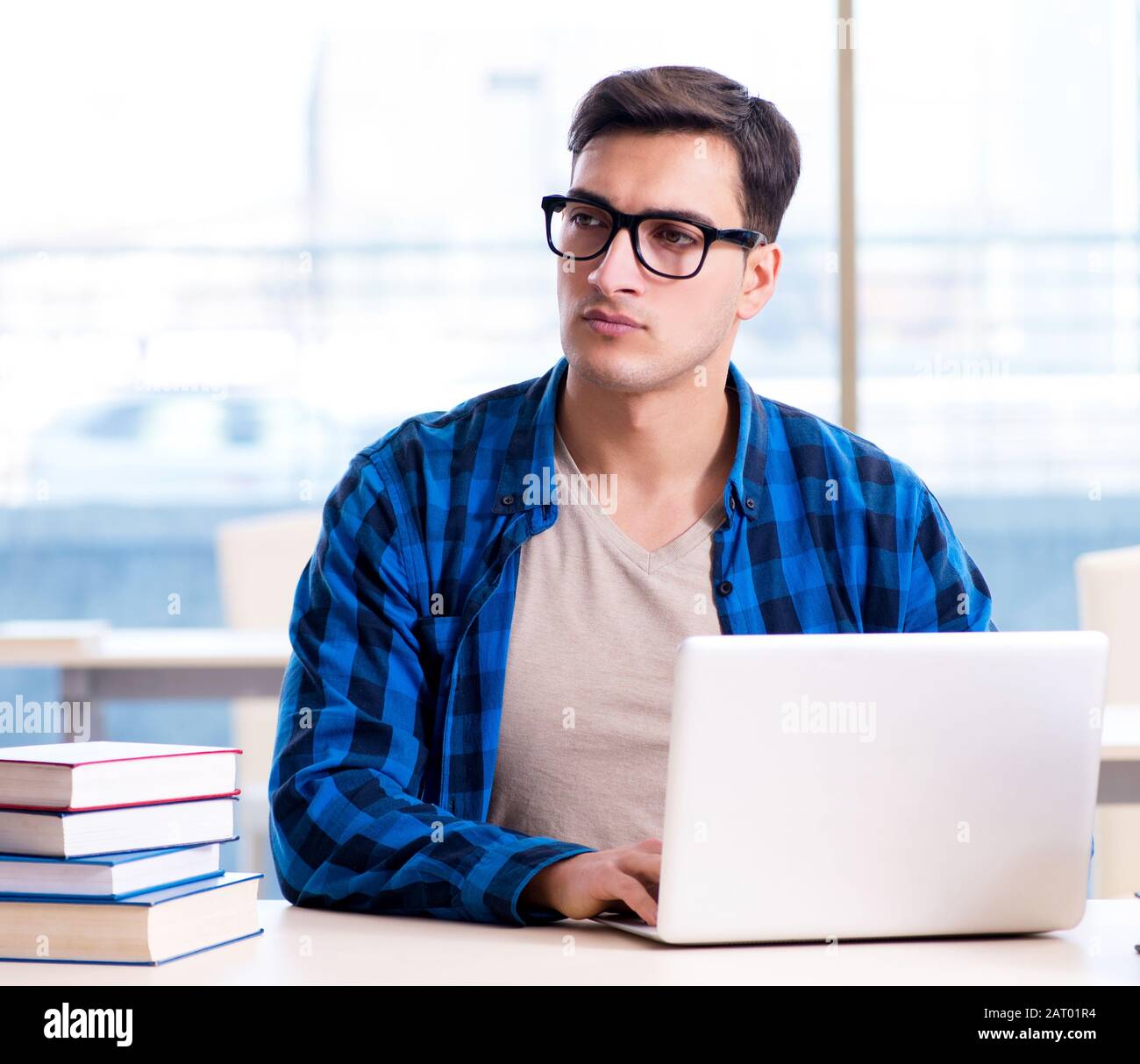 Student in telelearning distance learning concept reading in library ...