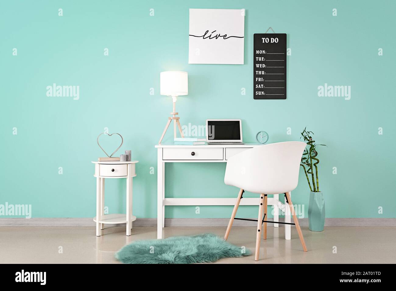 Interior of modern living room with turquoise elements Stock Photo - Alamy