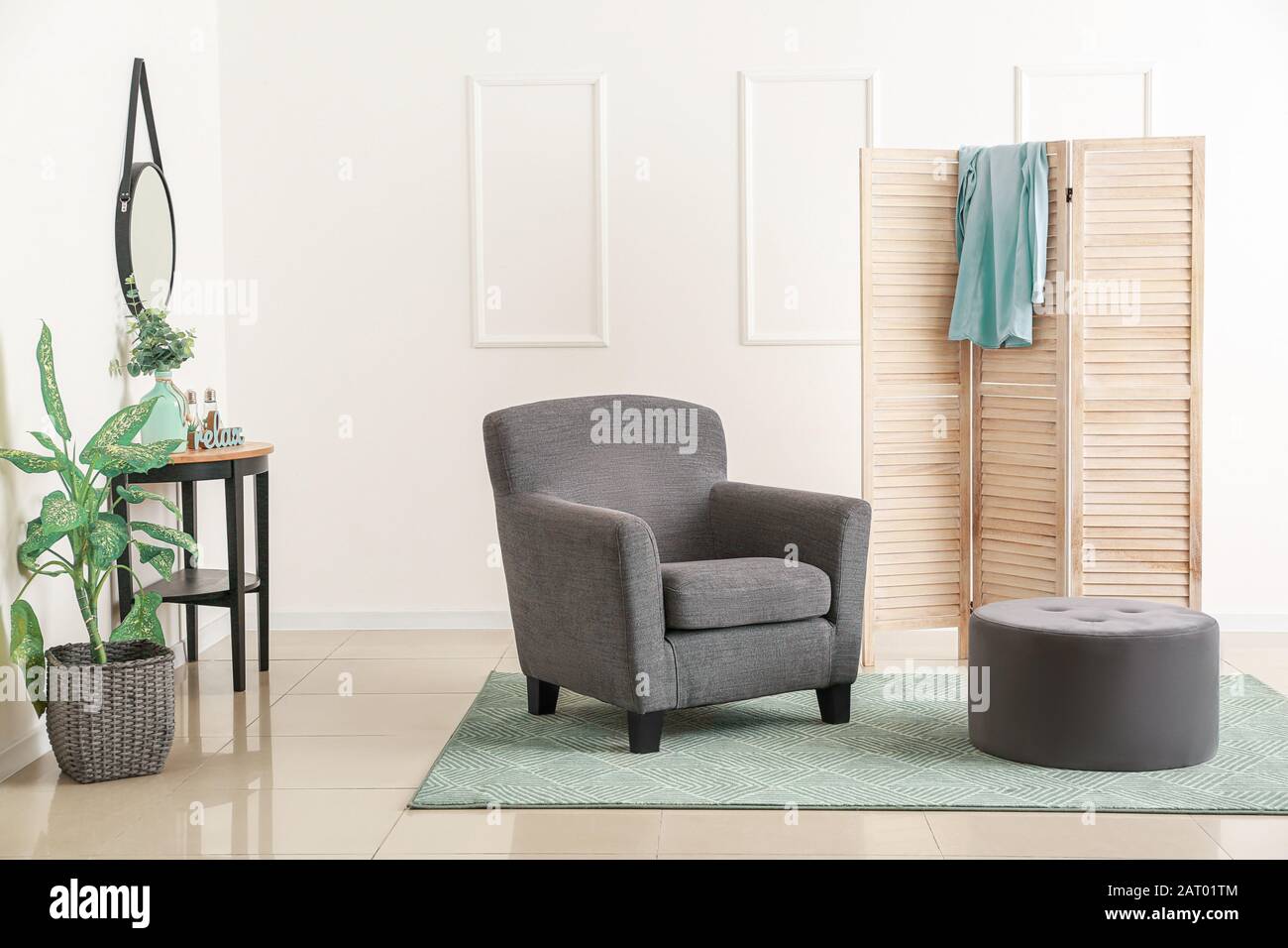 Interior of modern living room with turquoise elements Stock Photo - Alamy