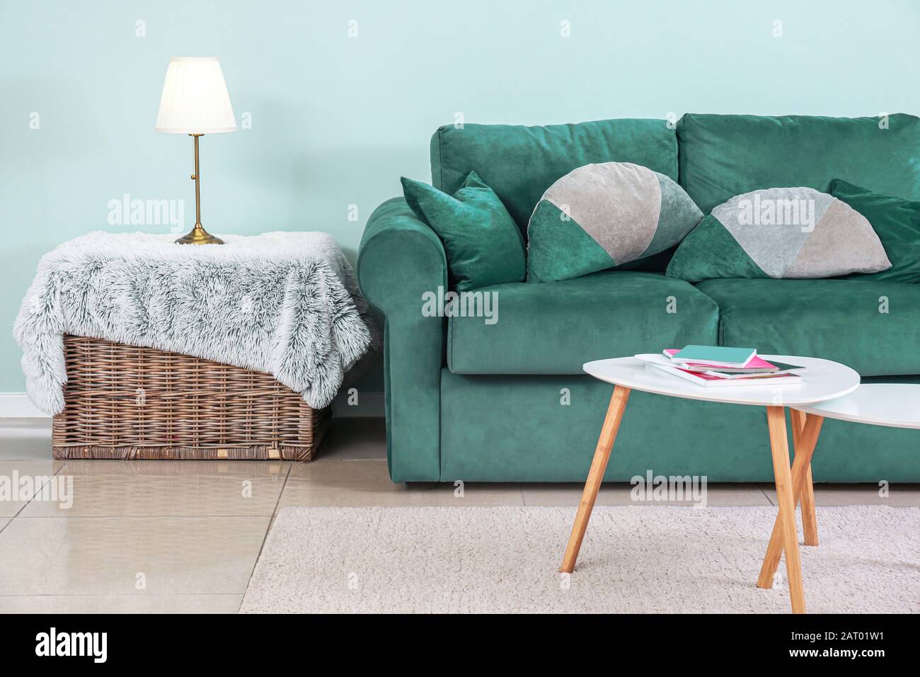 Interior of modern living room with turquoise elements Stock Photo - Alamy