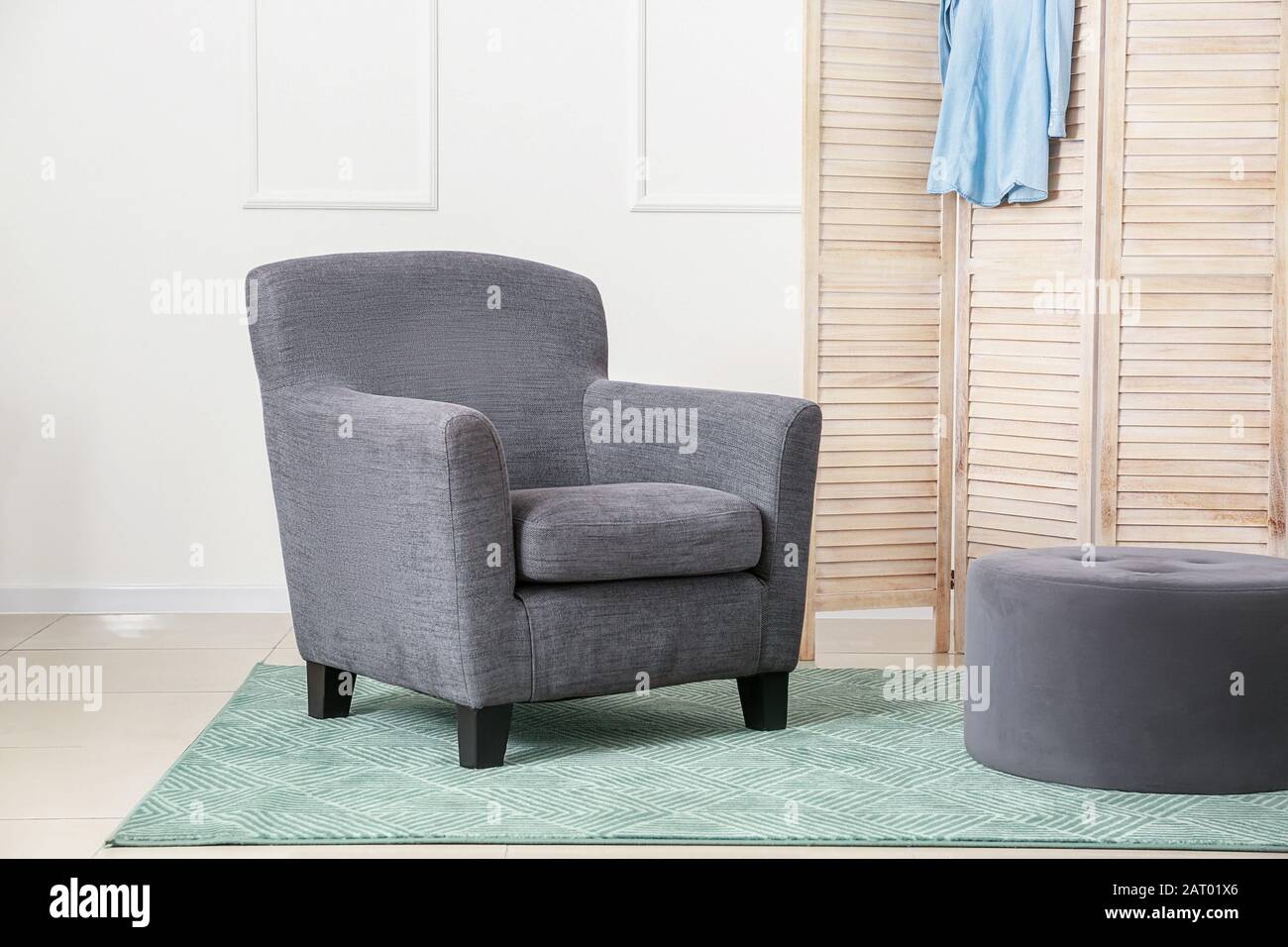 Interior of modern living room with turquoise elements Stock Photo - Alamy