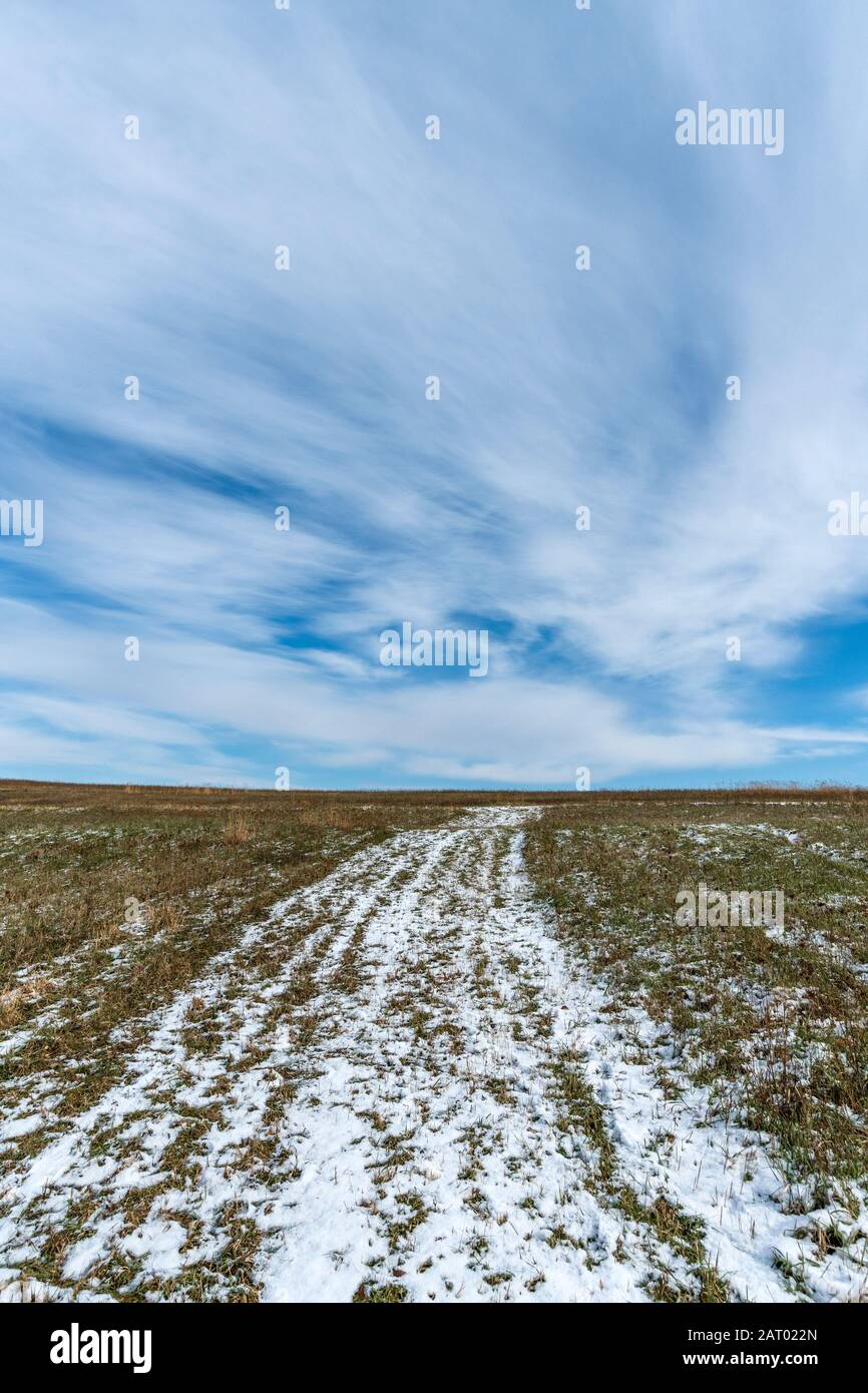 Snowy country road Stock Photo - Alamy
