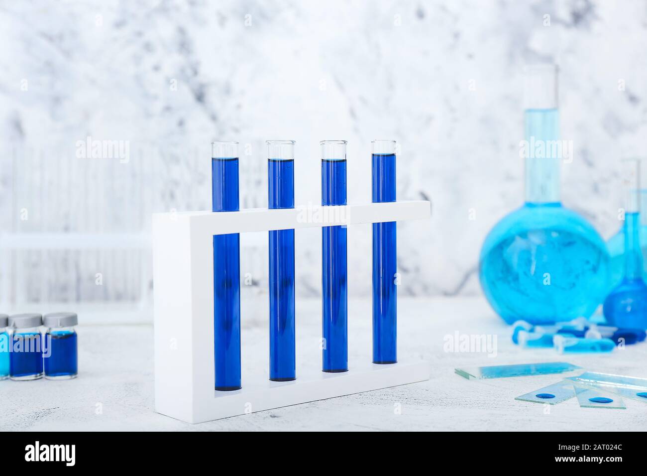 Test tubes with samples on white background Stock Photo - Alamy