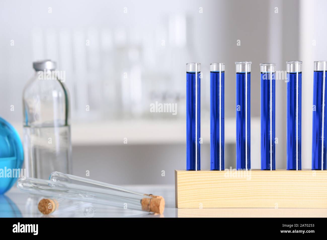 Test tubes with samples on table in laboratory Stock Photo - Alamy