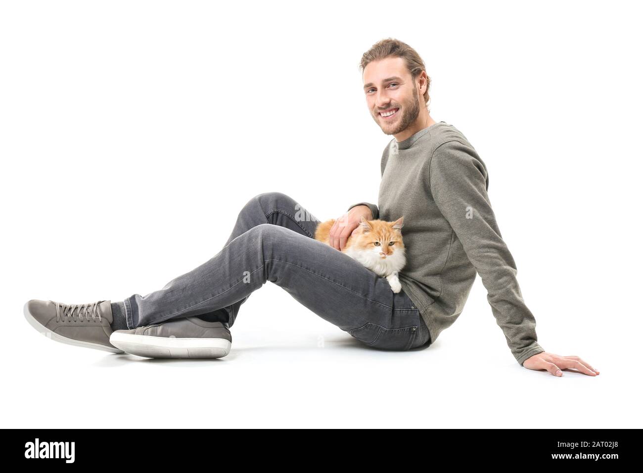 Man cat sitting on Cut Out Stock Images & Pictures - Alamy