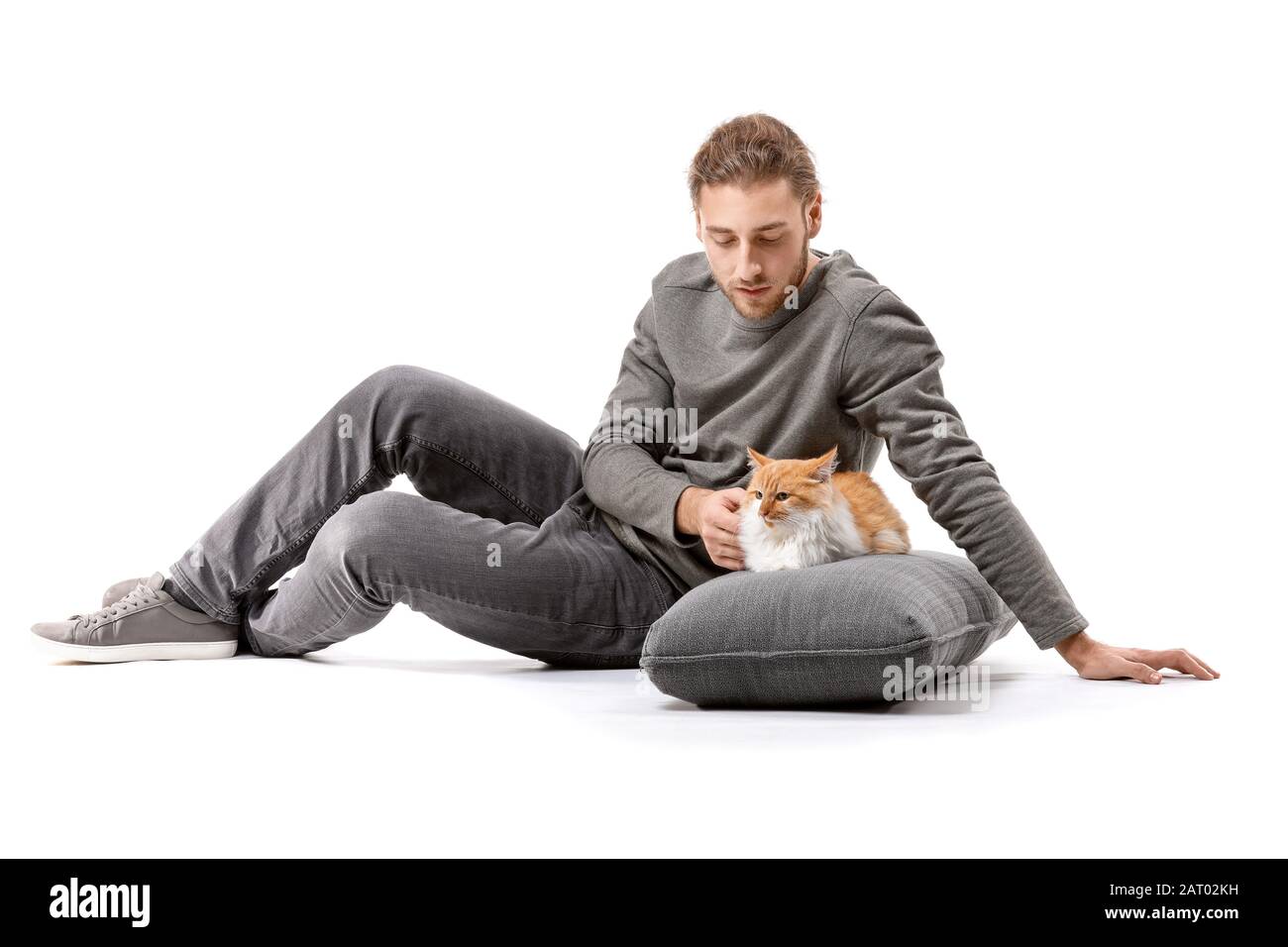 Man cat sitting on Cut Out Stock Images & Pictures - Alamy
