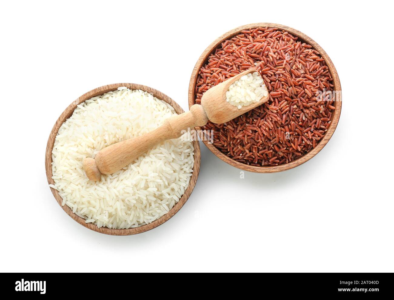 Plates with different raw rice on white background Stock Photo - Alamy