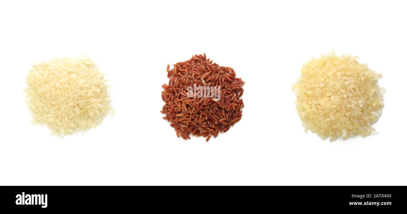 Different raw rice on white background Stock Photo - Alamy
