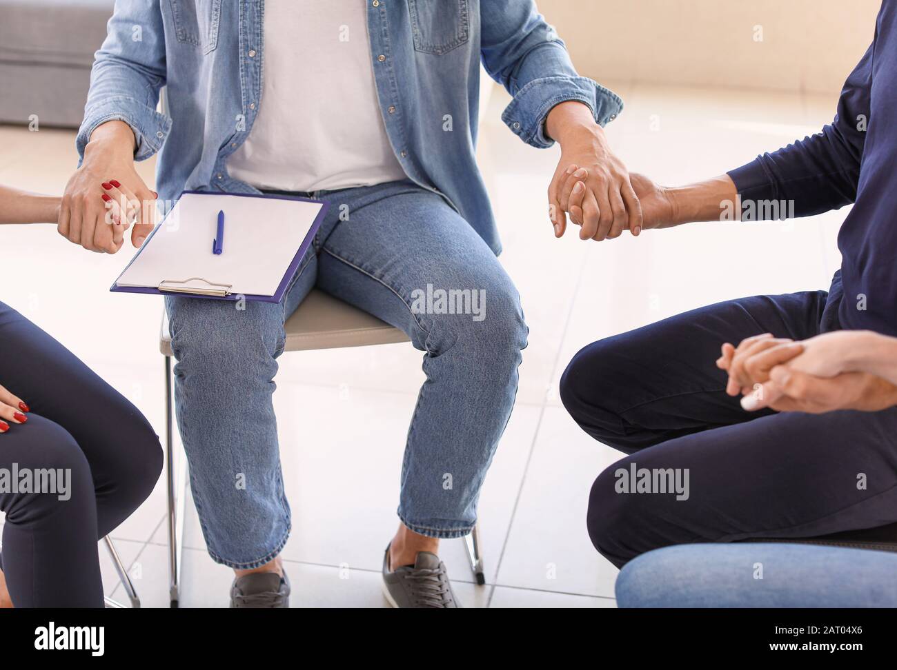 Group of young people during psychological support session Stock Photo ...