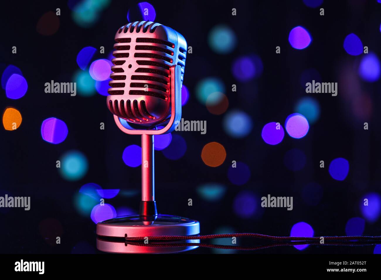 Retro metallic microphone against red hi-res stock photography and ...