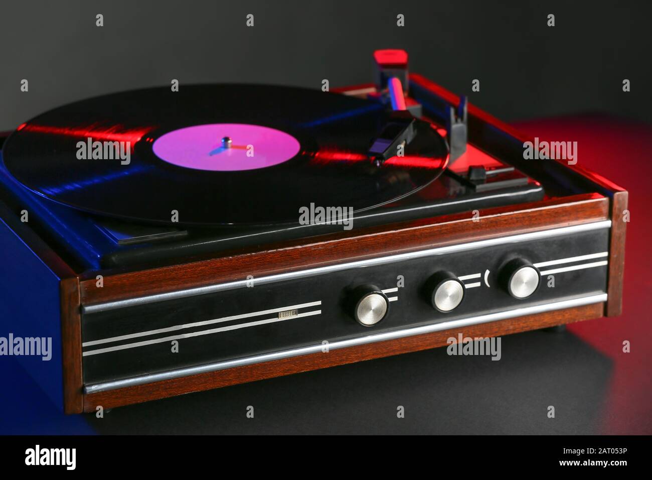 Record player with vinyl disc on dark background Stock Photo - Alamy