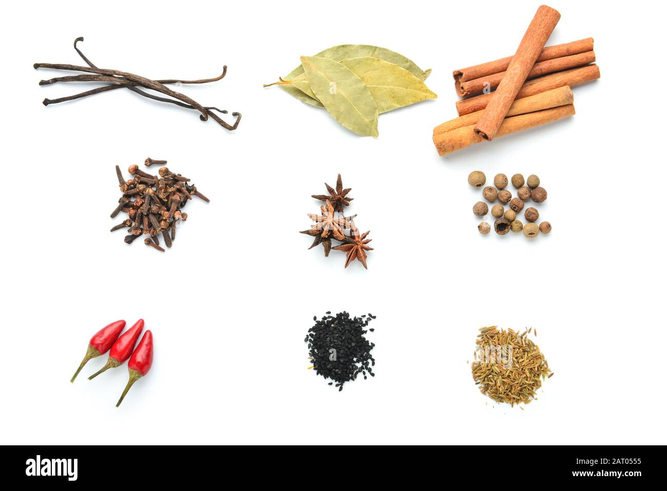 Many different spices on white background Stock Photo - Alamy