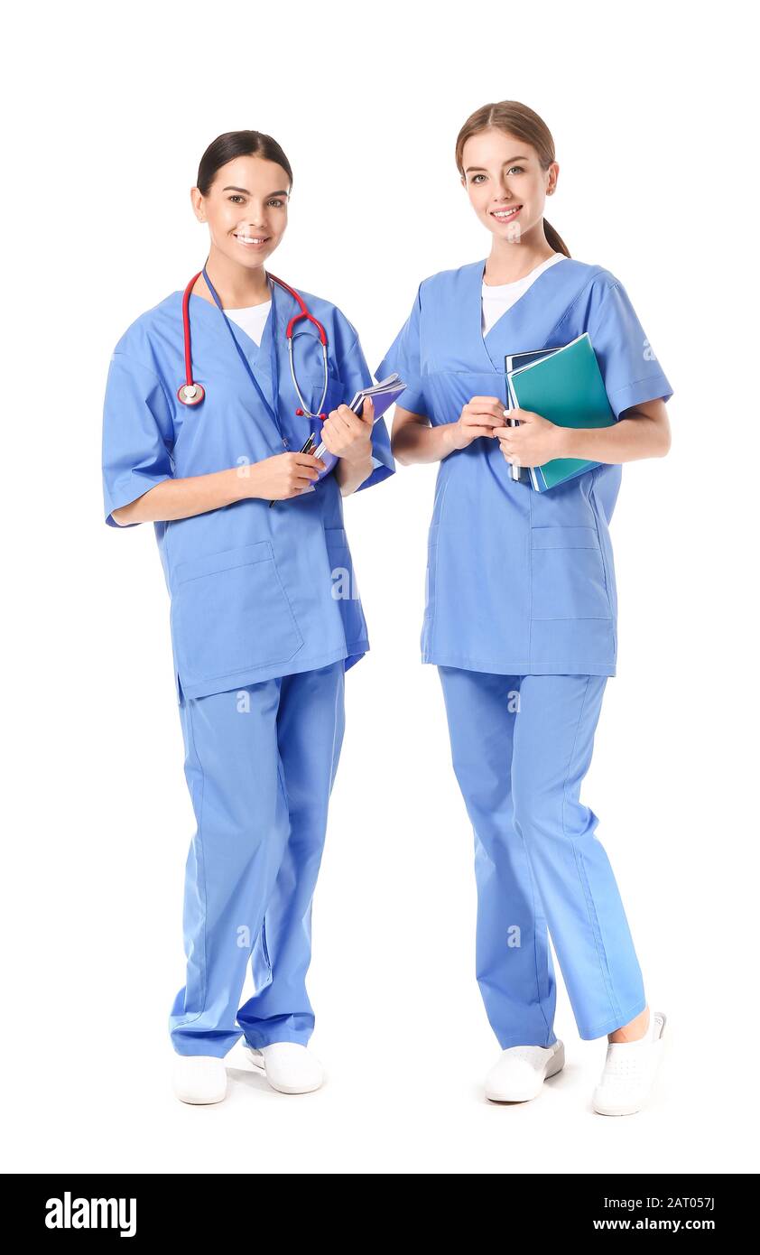 Female medical students on white background Stock Photo - Alamy