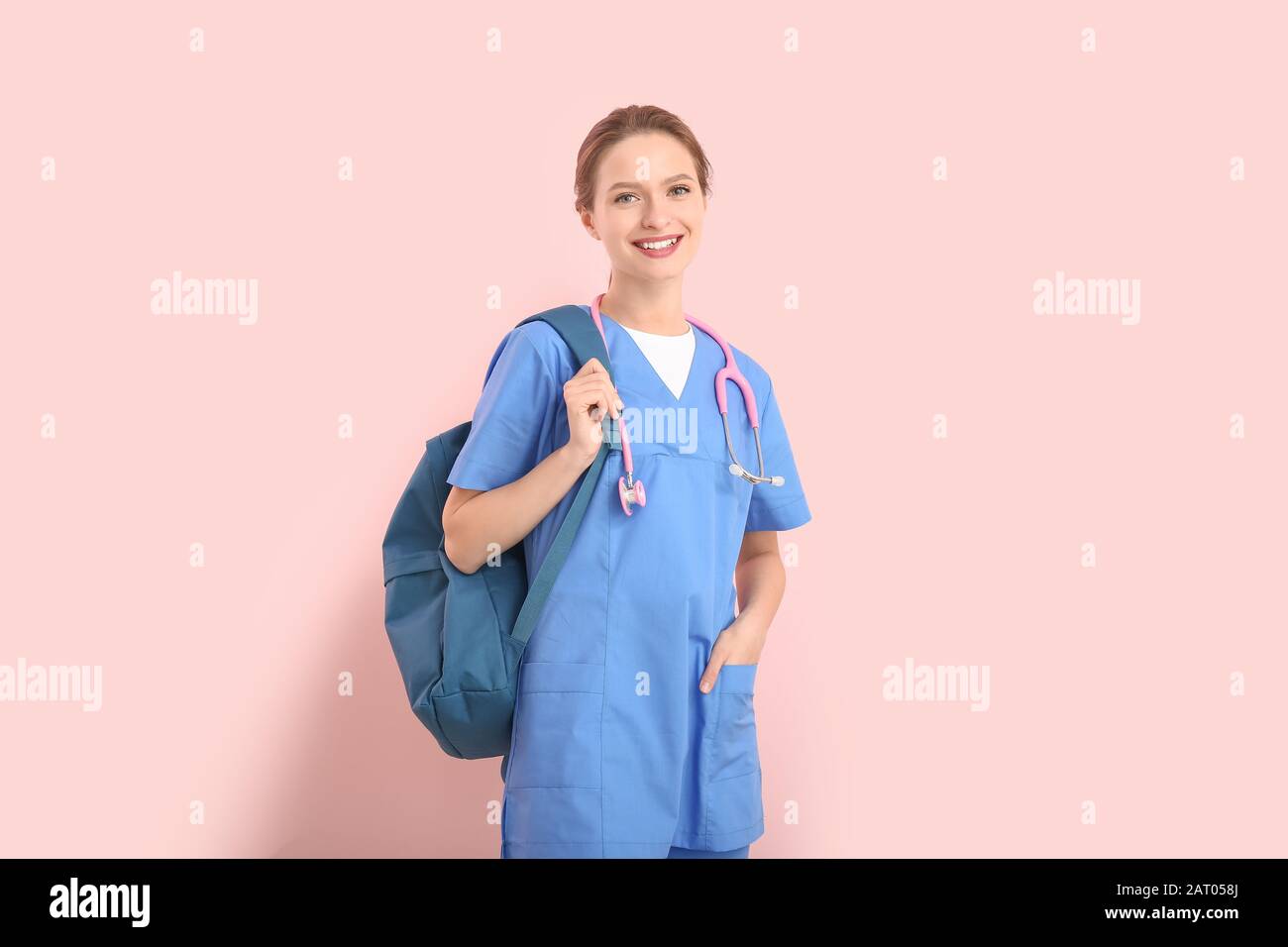 Female medical student on color background Stock Photo - Alamy