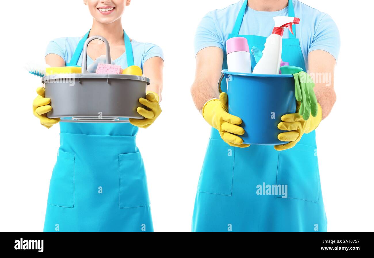 Janitors with cleaning supplies on white background Stock Photo - Alamy