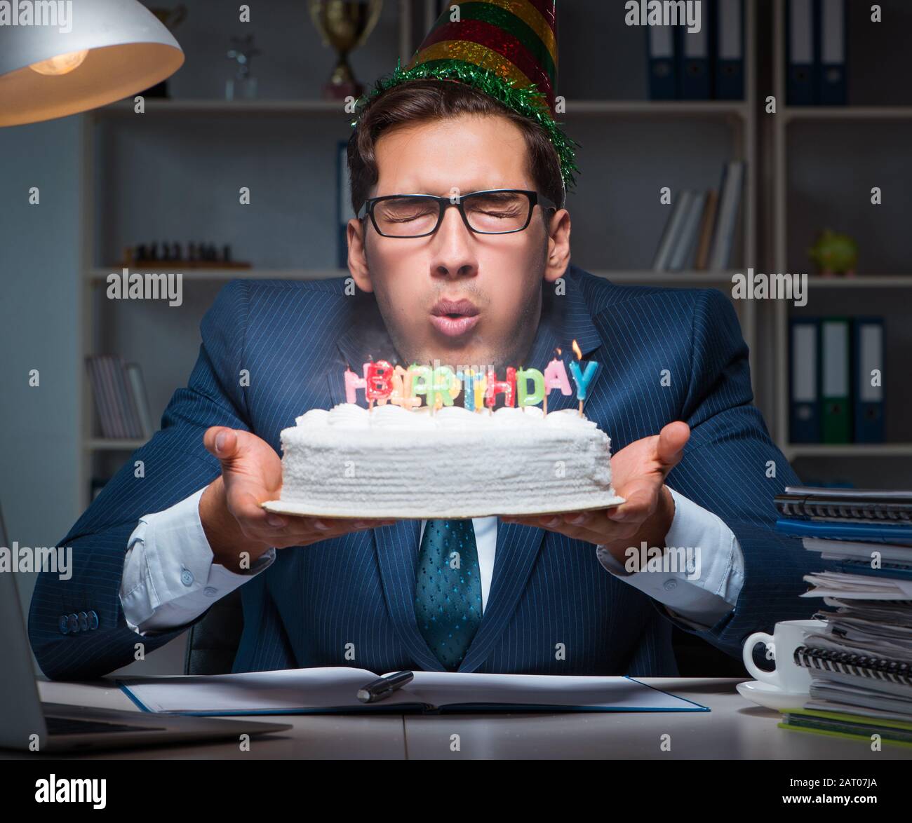 The man celebrating birthday in the office Stock Photo - Alamy