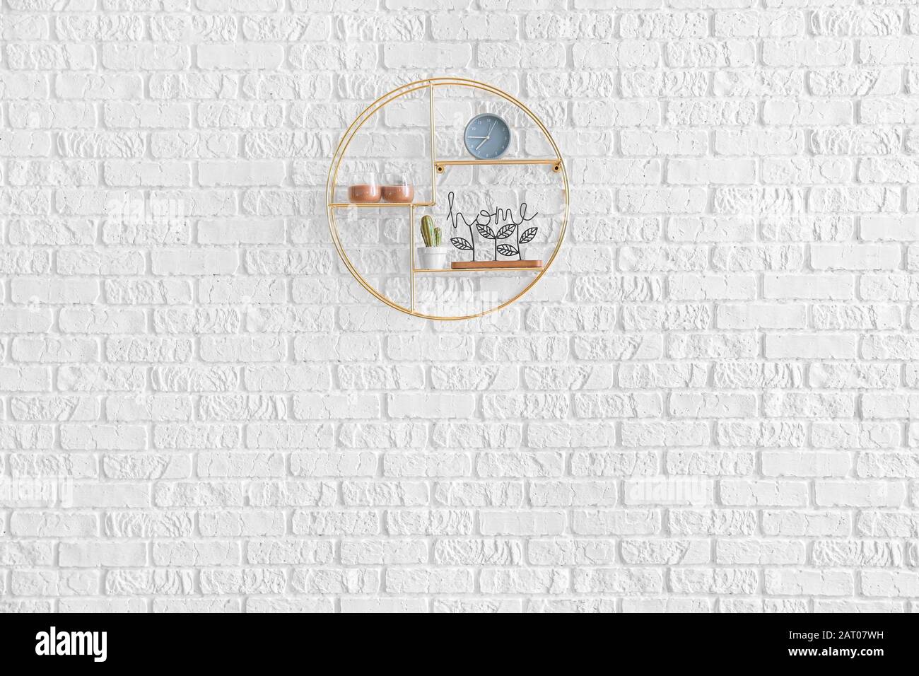 Hanging shelves on brick wall hi-res stock photography and images - Alamy