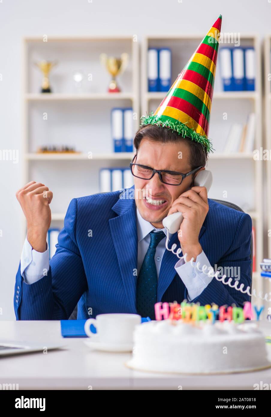 The man celebrating birthday in the office Stock Photo - Alamy