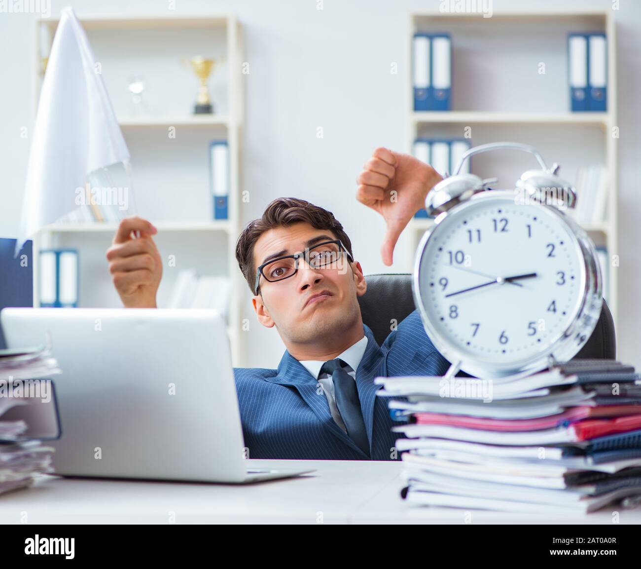 The businessman throwing white flag and giving up Stock Photo - Alamy