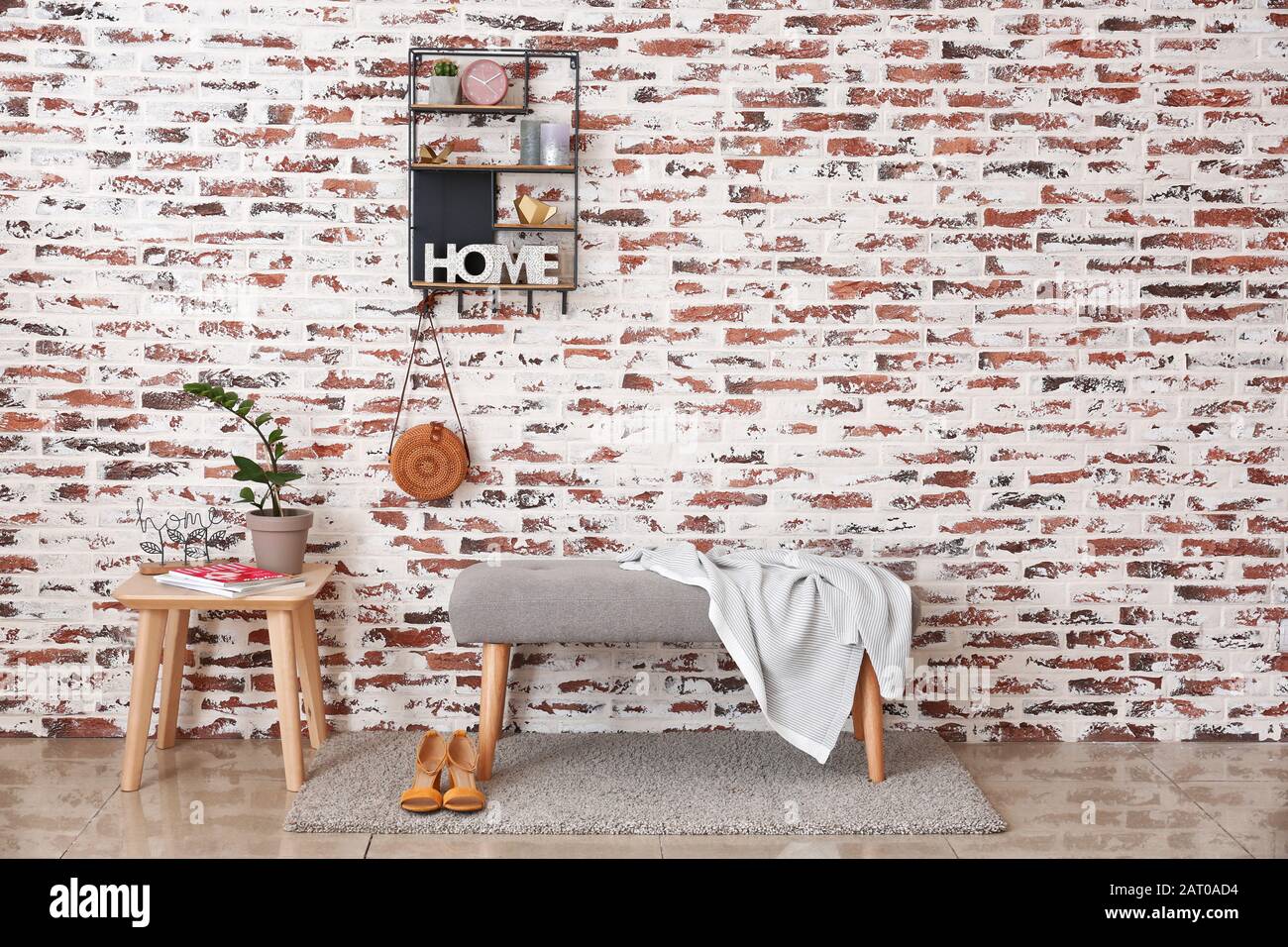 Interior of room with bench, table and shelf Stock Photo - Alamy