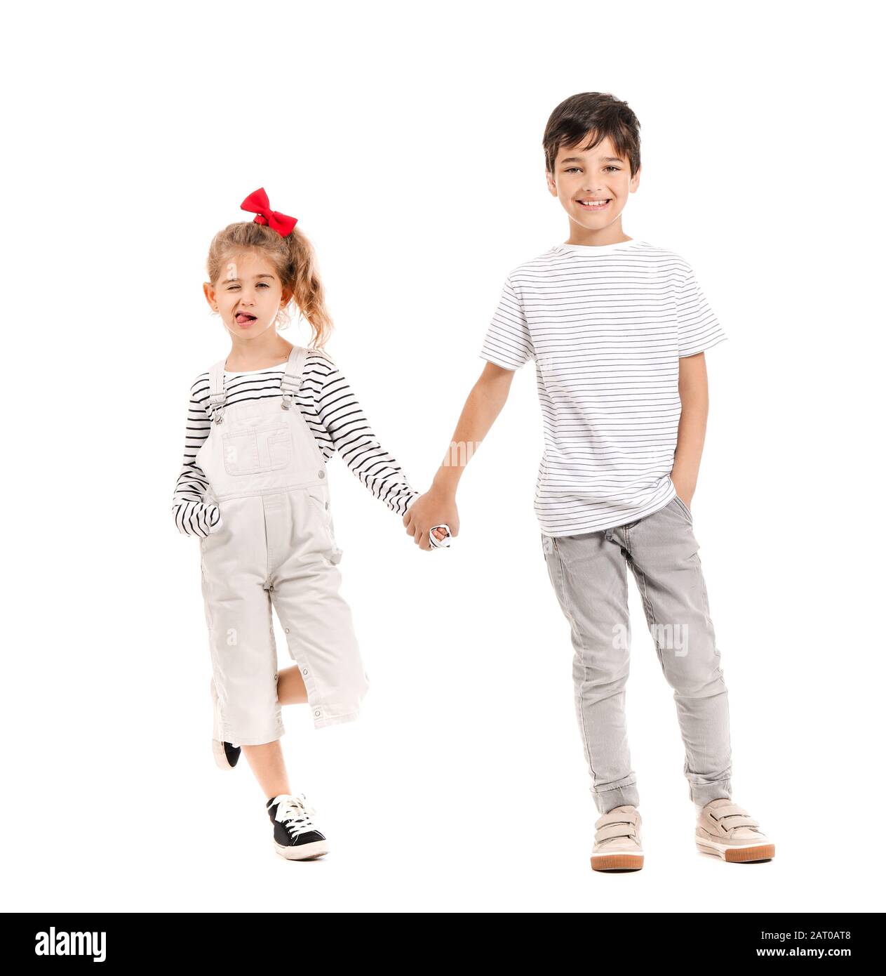 Cute little children on white background Stock Photo - Alamy