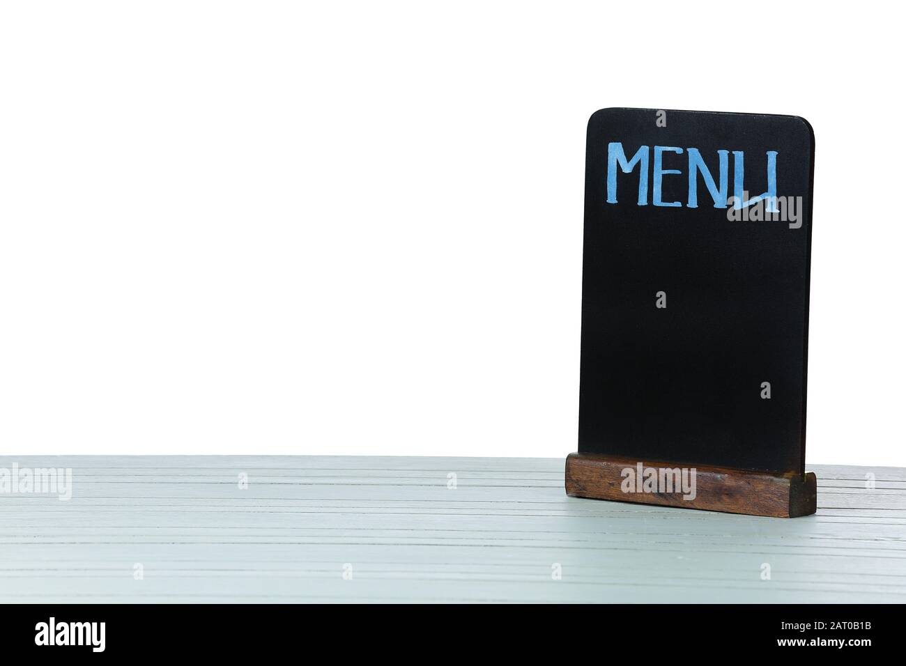 Blank menu on table against white background Stock Photo - Alamy