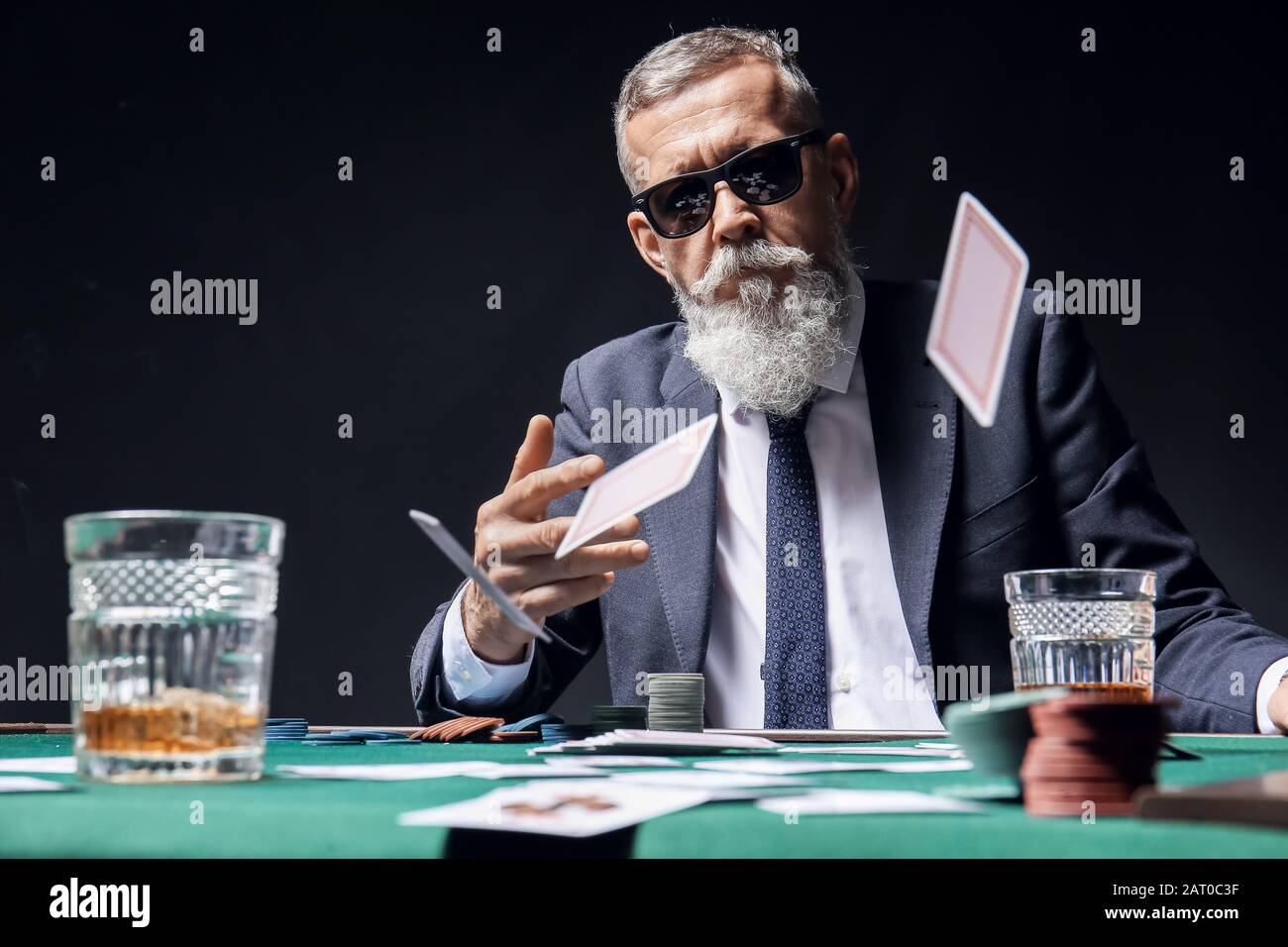 Businessman playing cards hi-res stock photography and images - Alamy