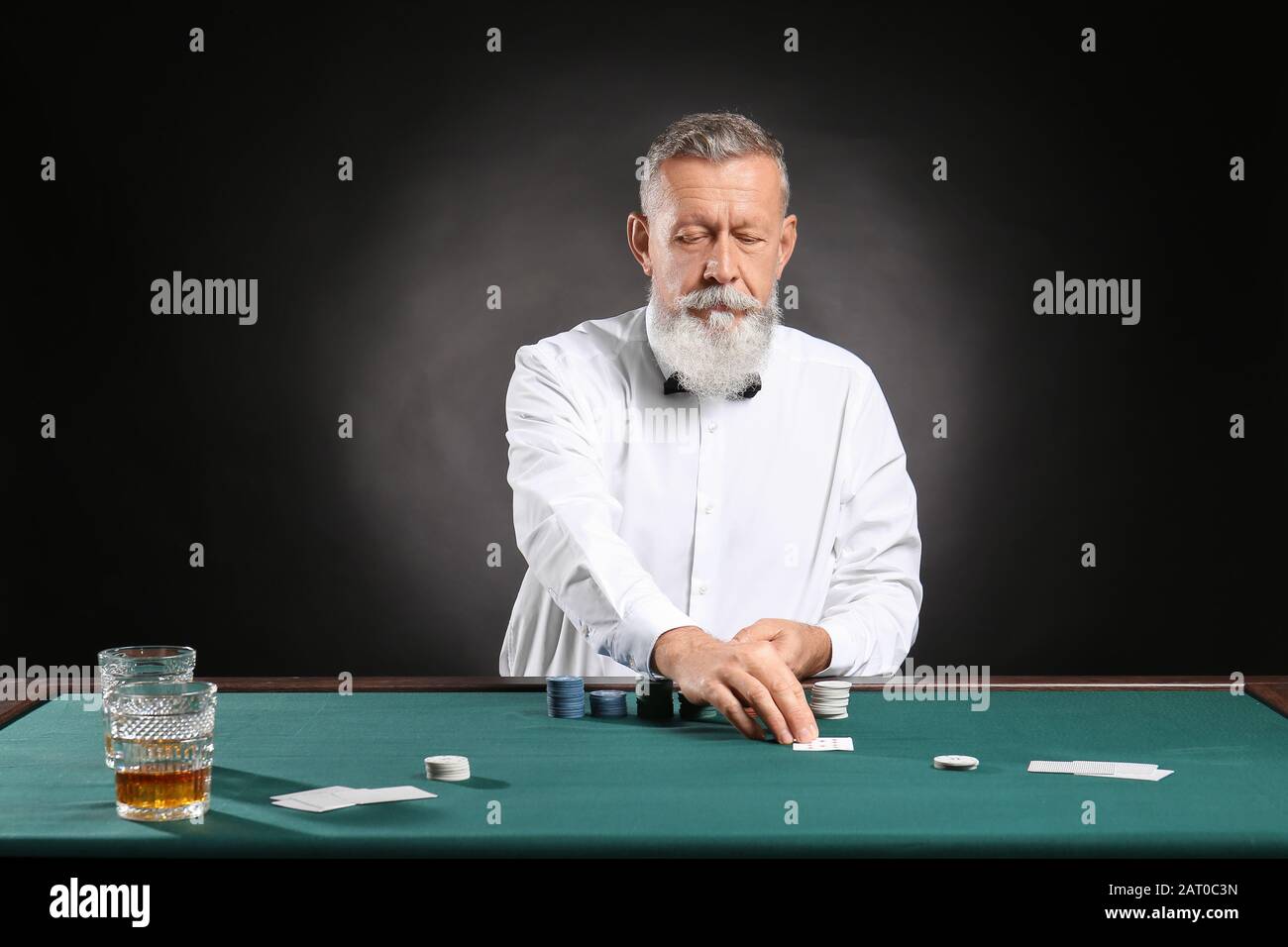 Male banker playing cards hi-res stock photography and images - Alamy