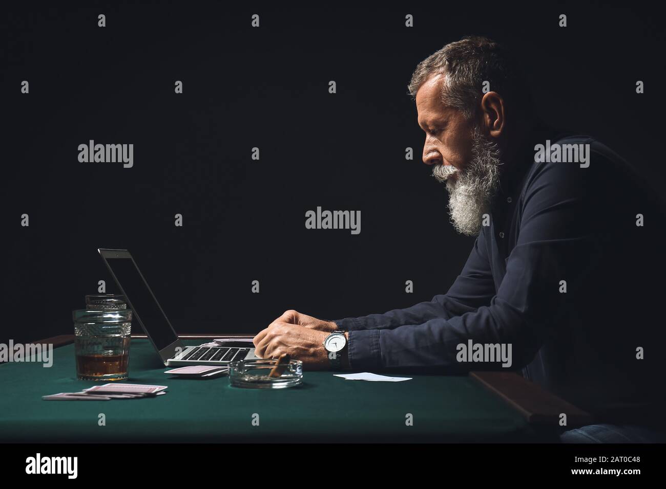 Modern businessman playing poker hi-res stock photography and images ...