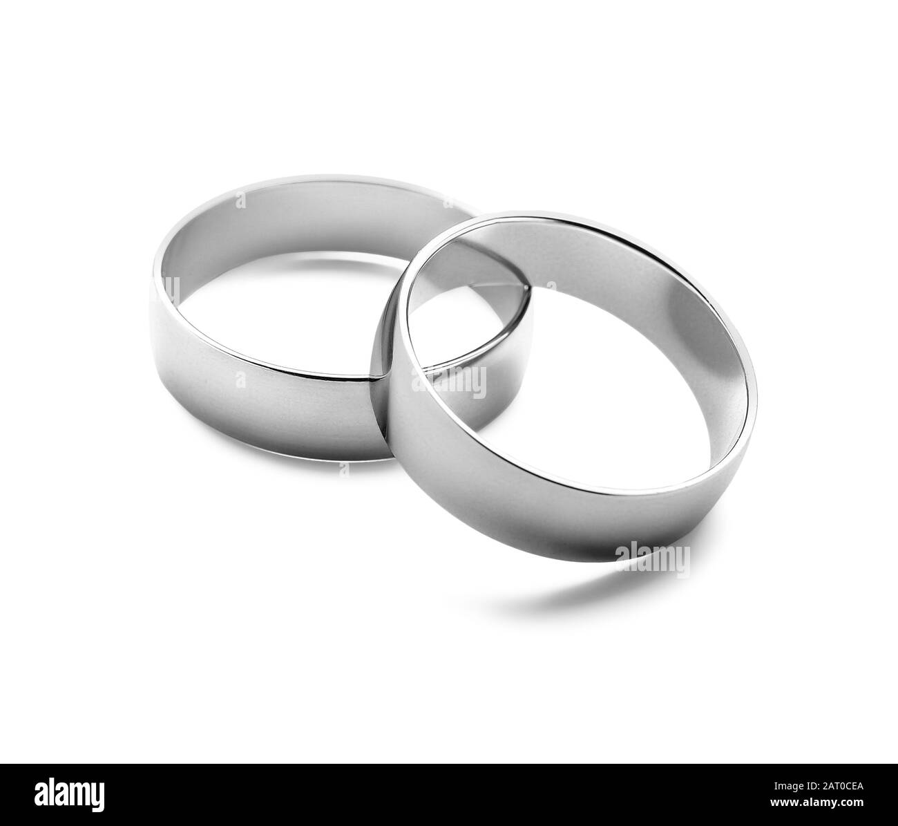 Pair of wedding rings on white background Stock Photo - Alamy
