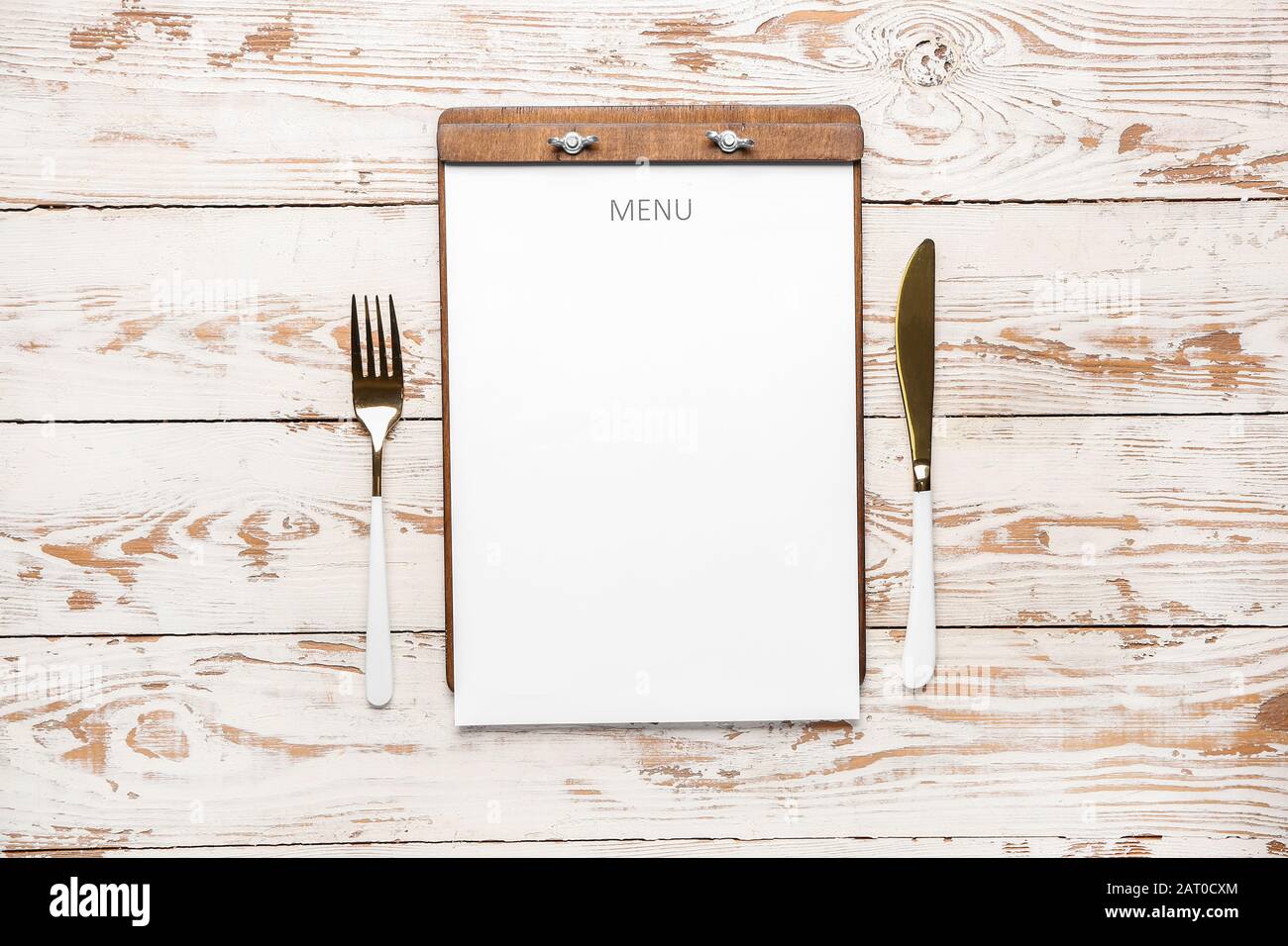 Blank menu and cutlery on wooden background Stock Photo - Alamy