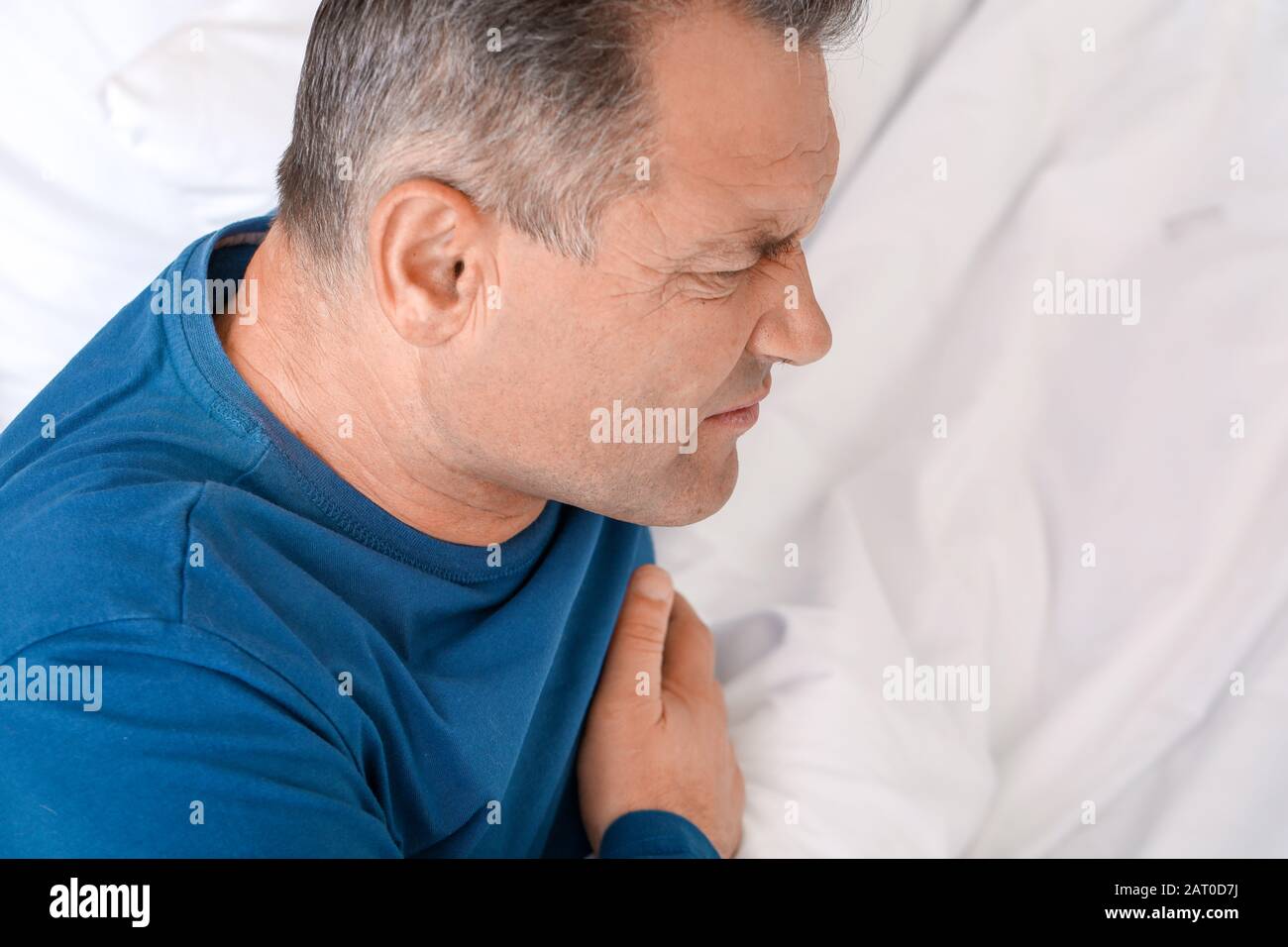 Heart attack man bed hi-res stock photography and images - Alamy