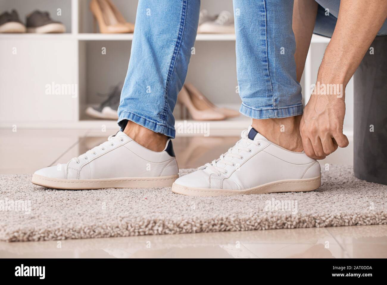 Man putting on pants hi-res stock photography and images - Alamy