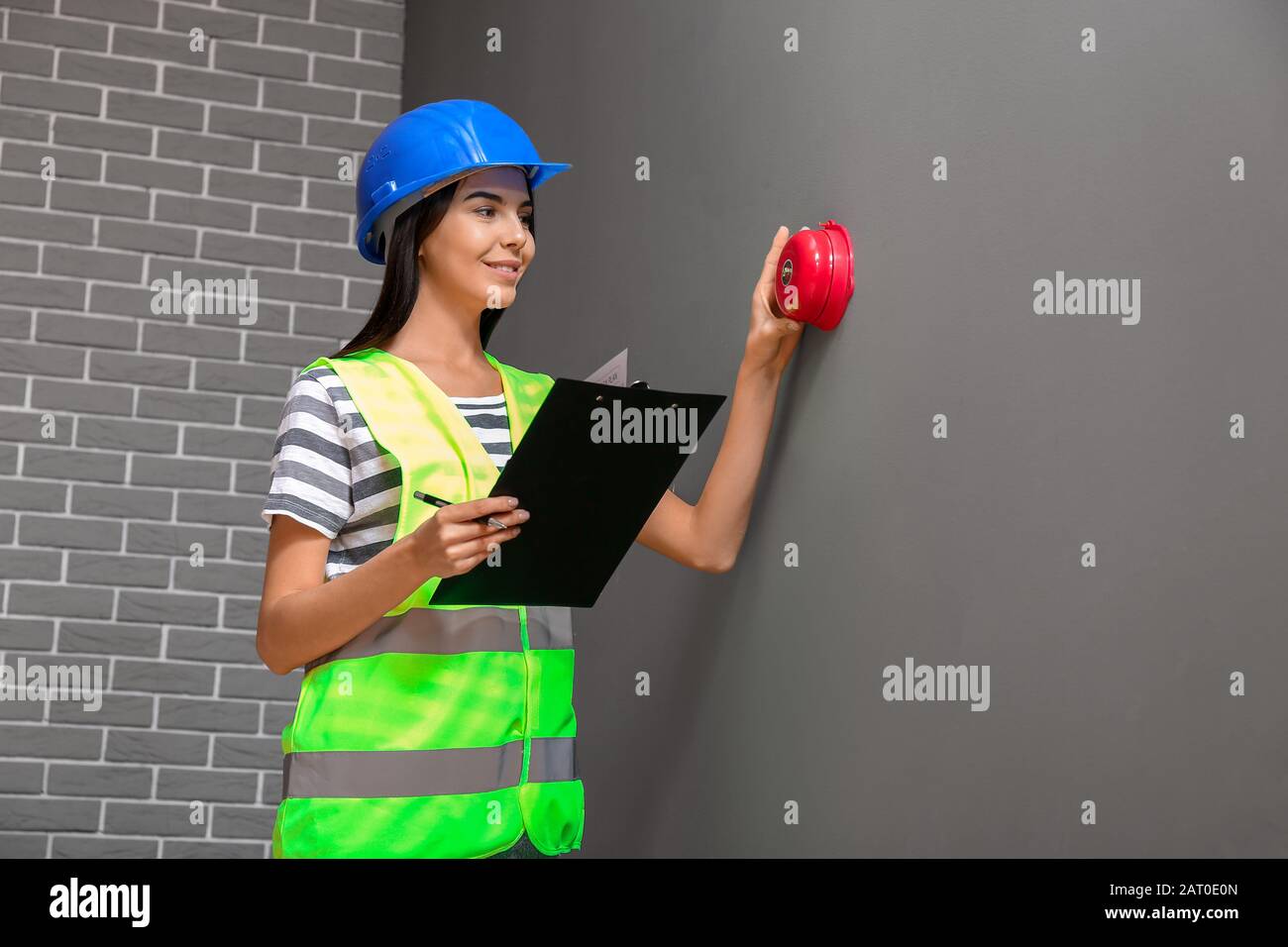 Fire safety specialist inspecting building Stock Photo - Alamy