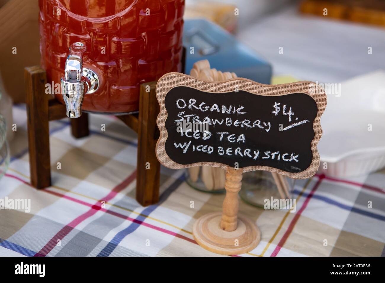 Hand written black sign indicating the ingredients of an iced tea ...