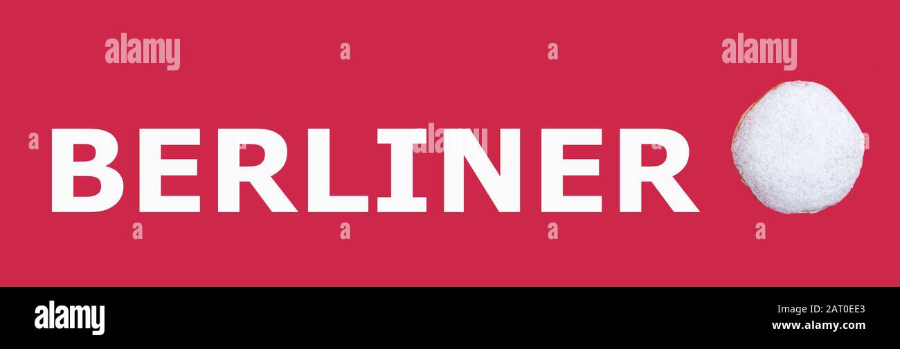 Culinary Berliner Donut on red background Stock Photo - Alamy