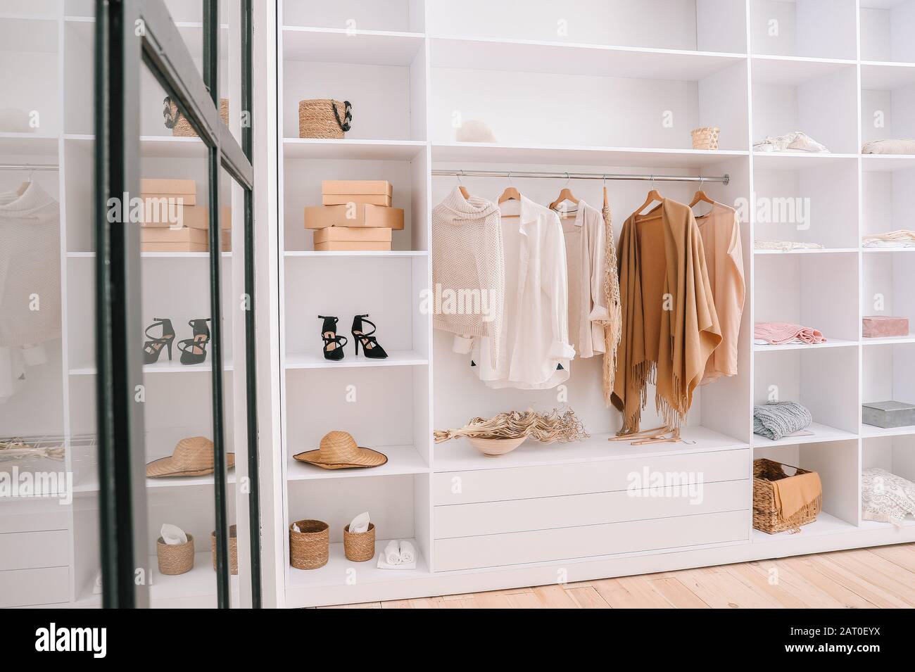 Wardrobe with stylish female clothes Stock Photo - Alamy