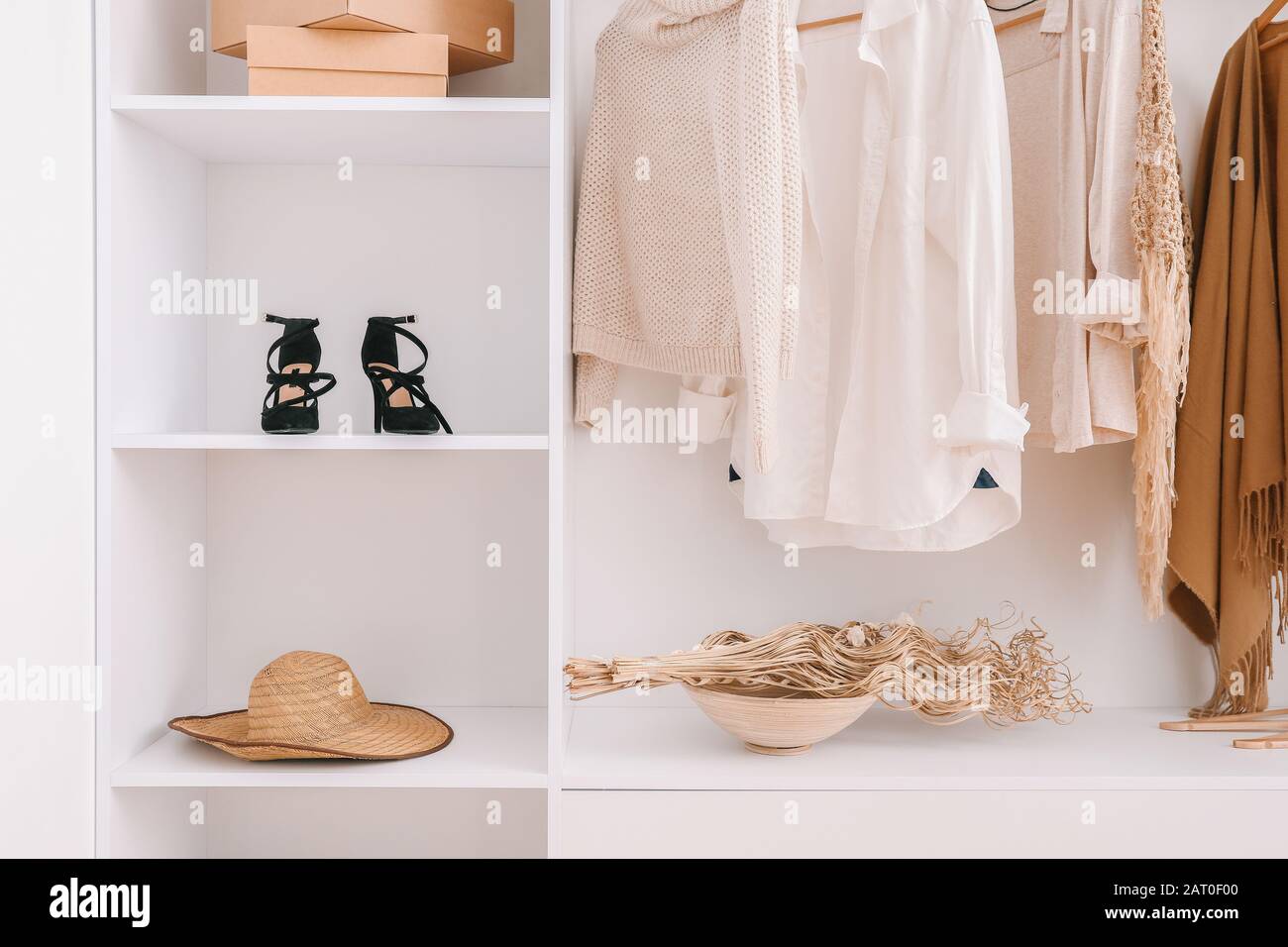 Wardrobe with stylish female clothes Stock Photo - Alamy