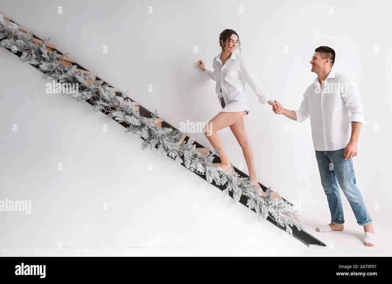 Couple going upstairs hi-res stock photography and images - Alamy
