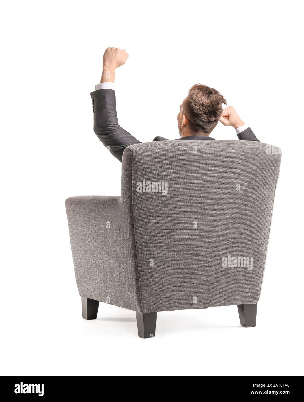 Businessman sitting in armchair on white background, back view Stock ...