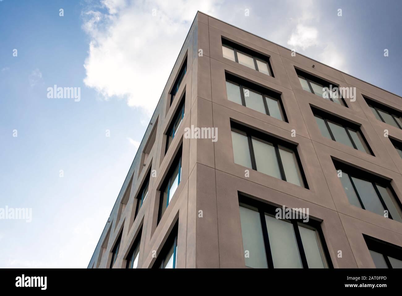 Modern gray skyscraper facade in detail Stock Photo - Alamy