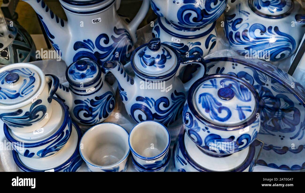 Traditional german stoneware painted in blue get offered in a showroom ...
