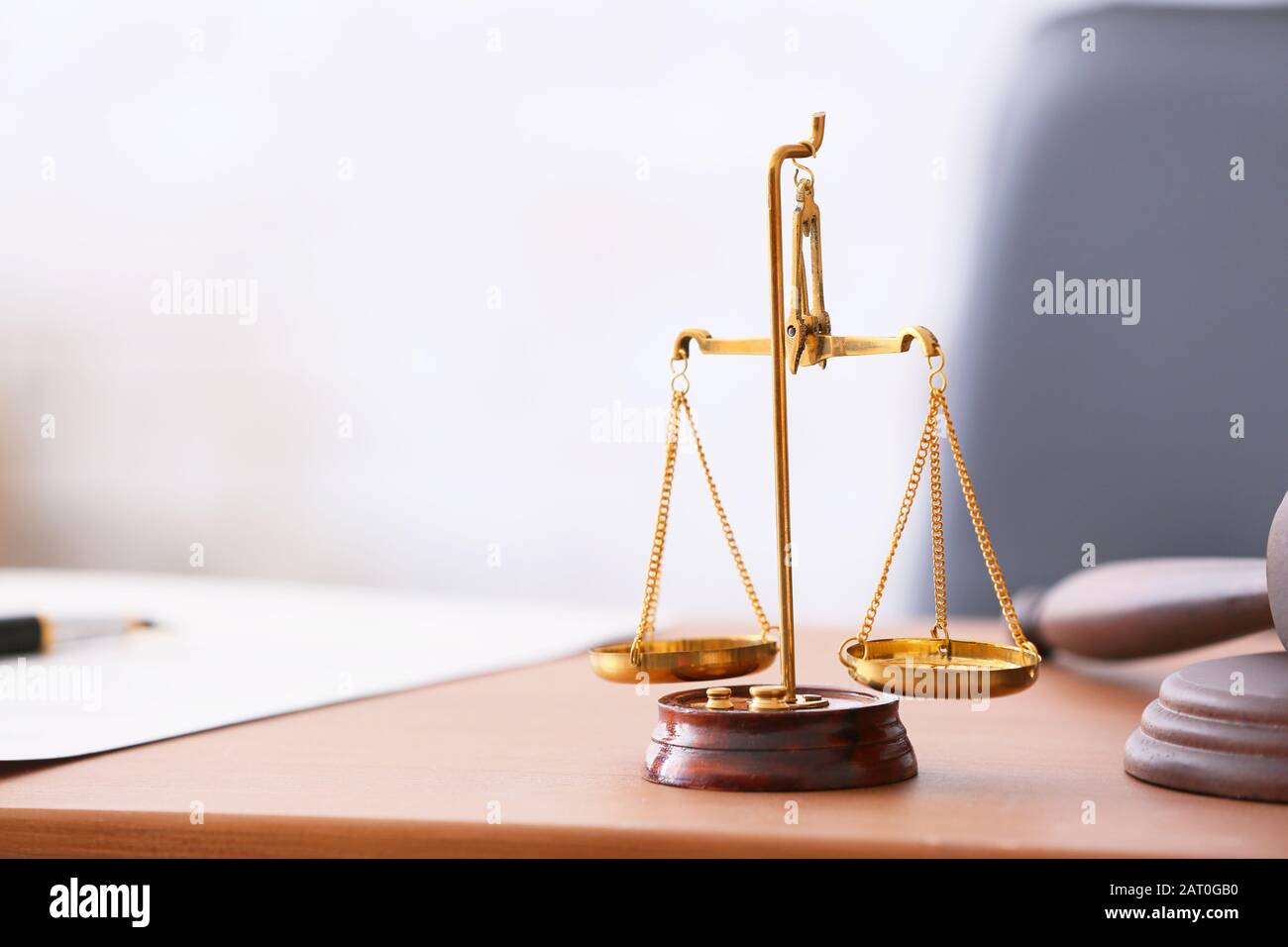 Scales of justice on lawyer's workplace Stock Photo - Alamy