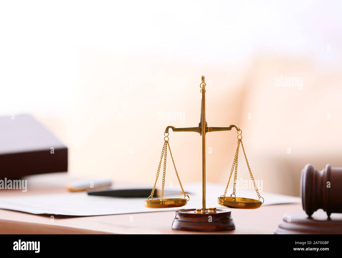 Scales of justice on lawyer's workplace Stock Photo - Alamy