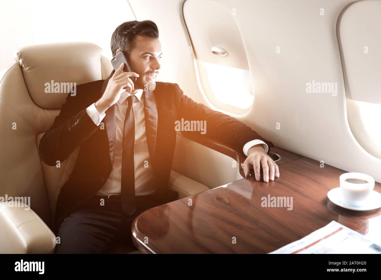 Airplane passenger man speaking hi-res stock photography and images - Alamy