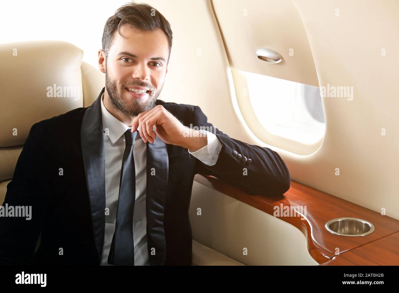 Man first class plane hi-res stock photography and images - Alamy