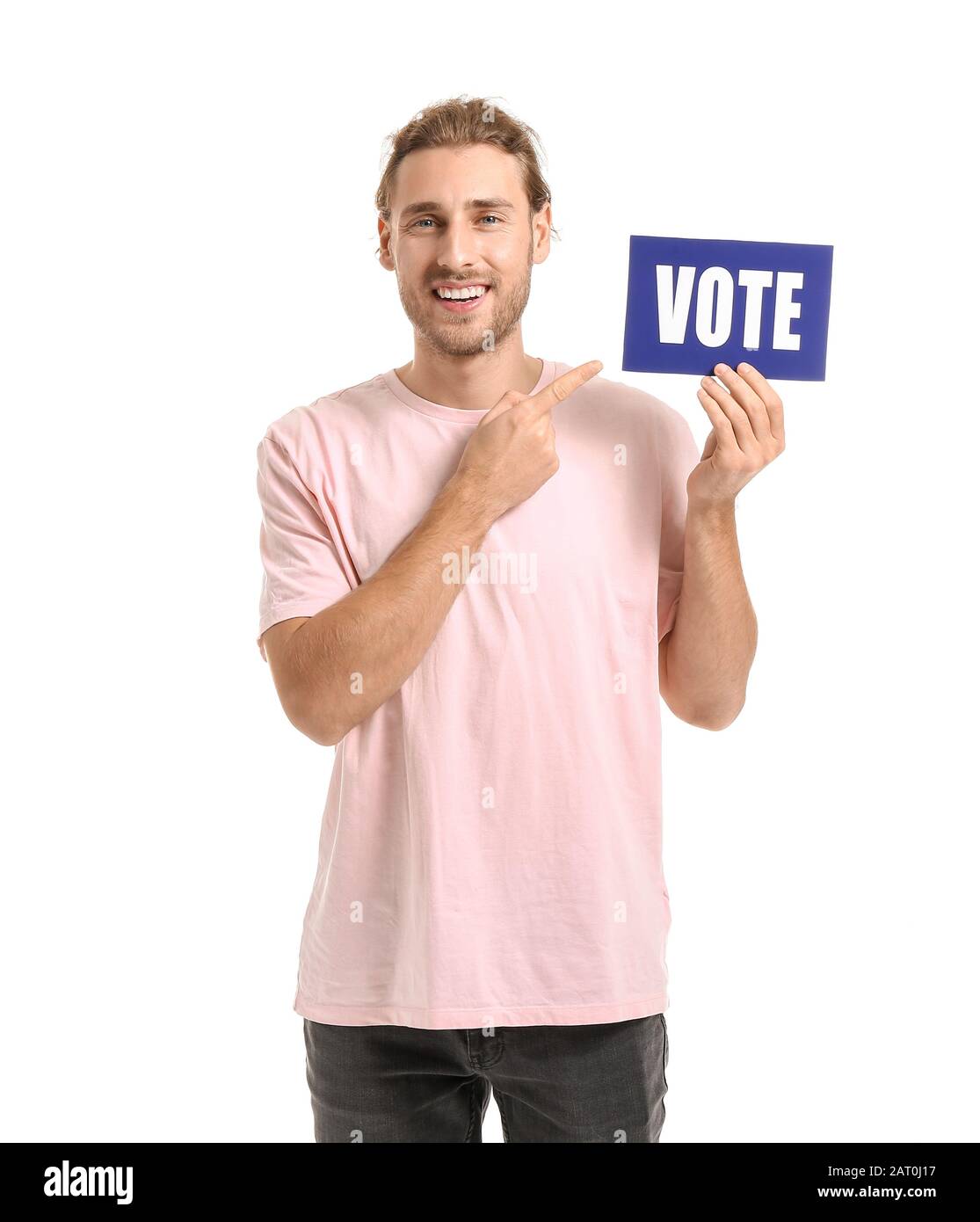 Young man holding vote Cut Out Stock Images & Pictures - Alamy